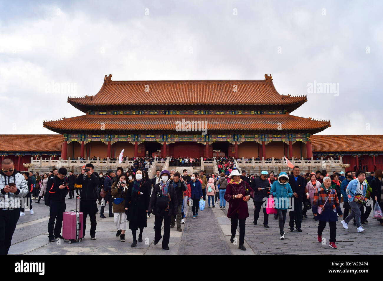 Beijing, China, March 30, 2019: Chinese people walking in Beijing, the ...
