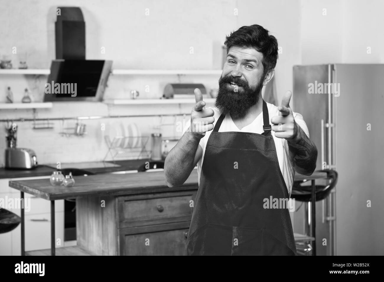 Special offer from chef. Man chef cooking. Restaurant or cafe cook ...