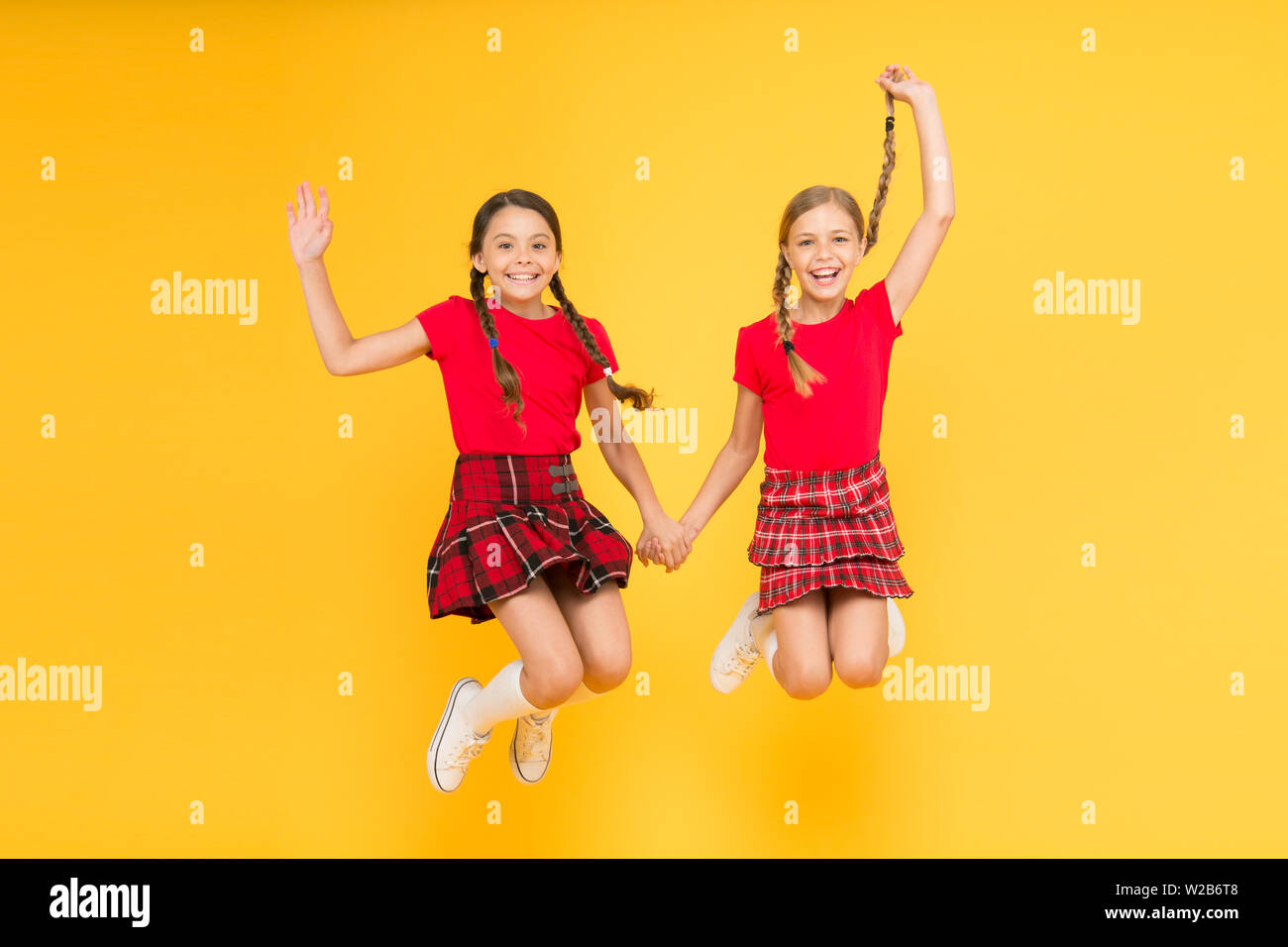 Join celebration. Kids girl wear checkered dresses. National holiday ...