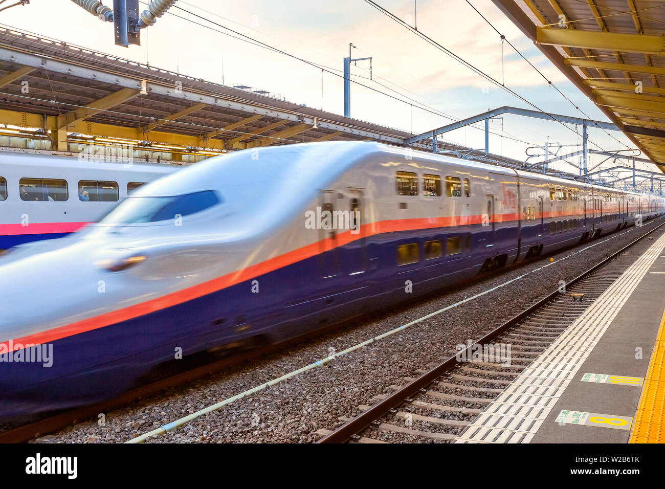 Tokyo, Japan - April 27 2018: Japanese Shinkansen high speed train at a train station Stock ...