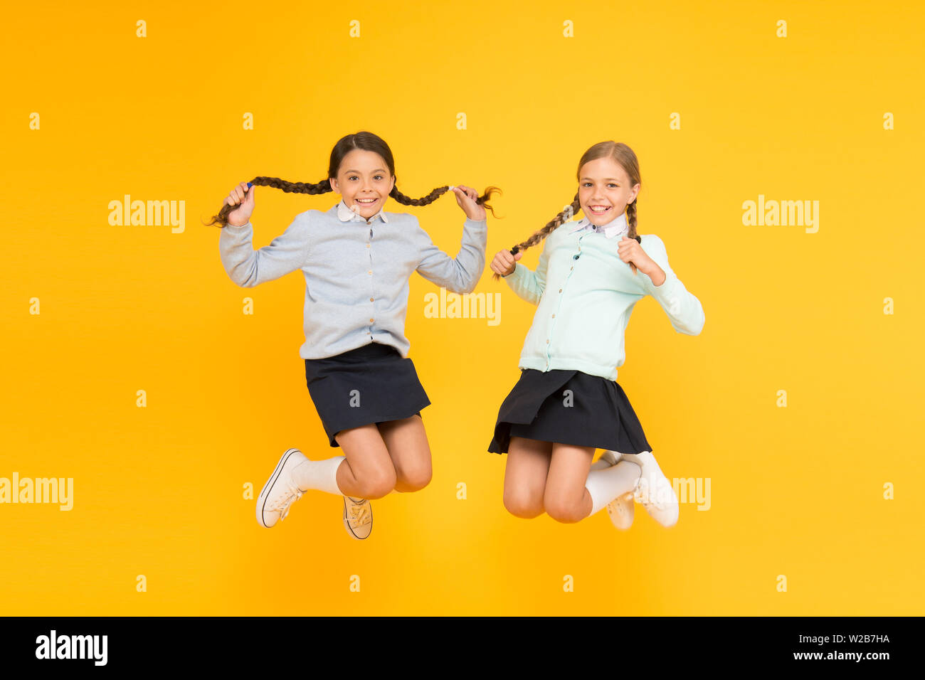 Secondary school. Kids cute students. Schoolgirls best friends ...