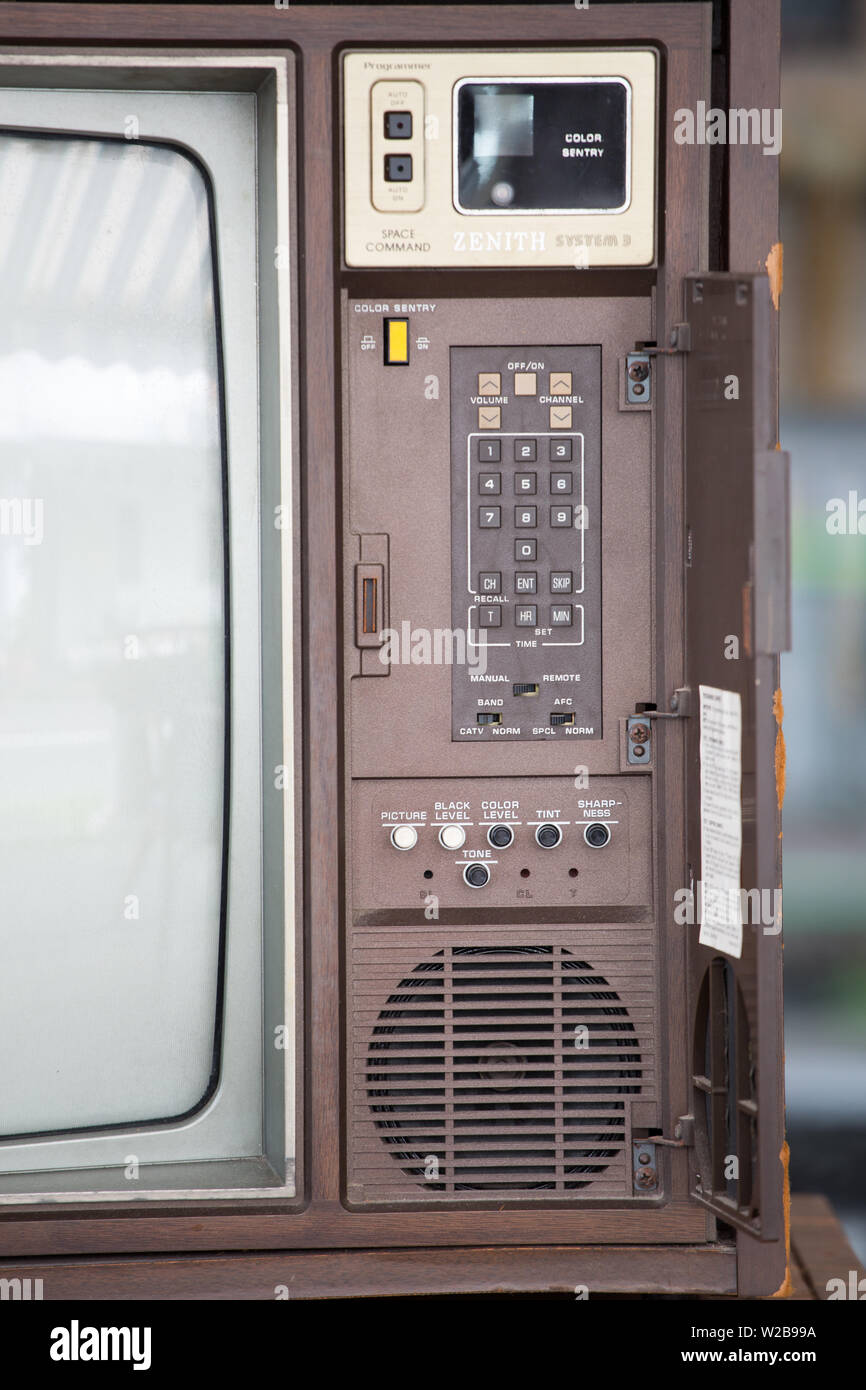 Tradition television set with buttons set with various function on it ...