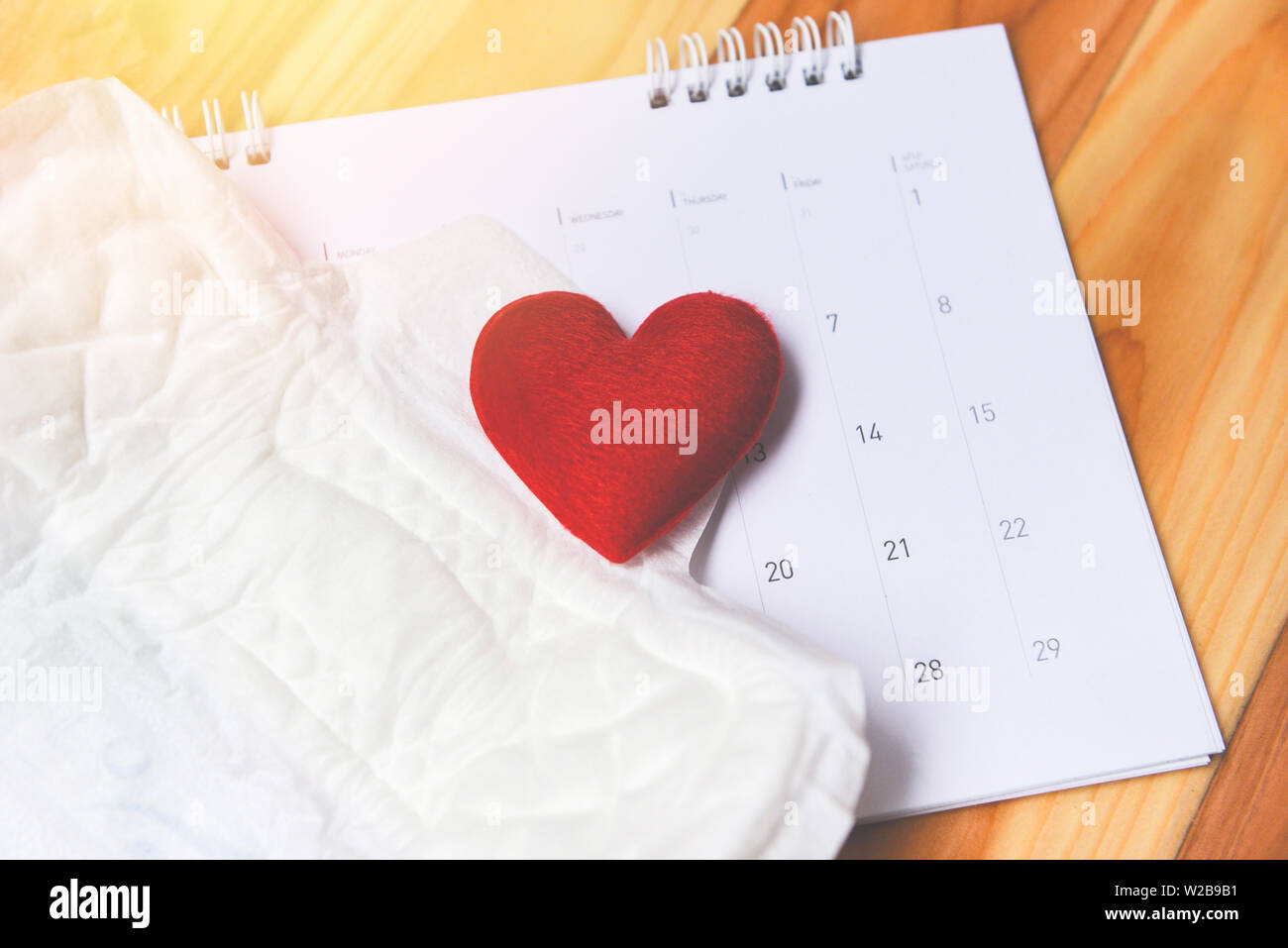 Sanitary Napkin Or Feminine Sanitary Pad On Calendar With Red Heart Female Hygiene Means Women