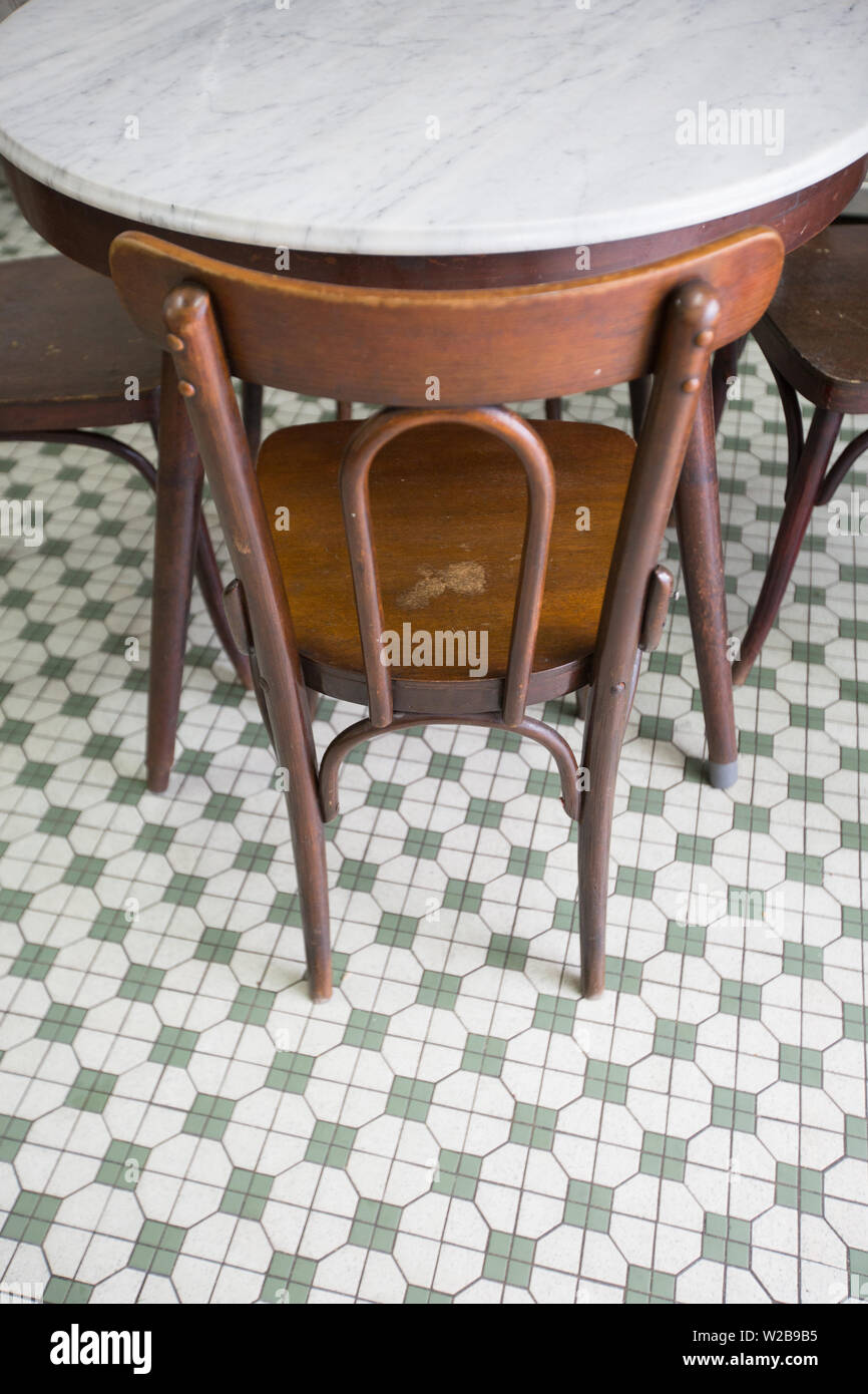 Traditional old tiles, chairs and tables in Chin Mee Chin Confectionery ...