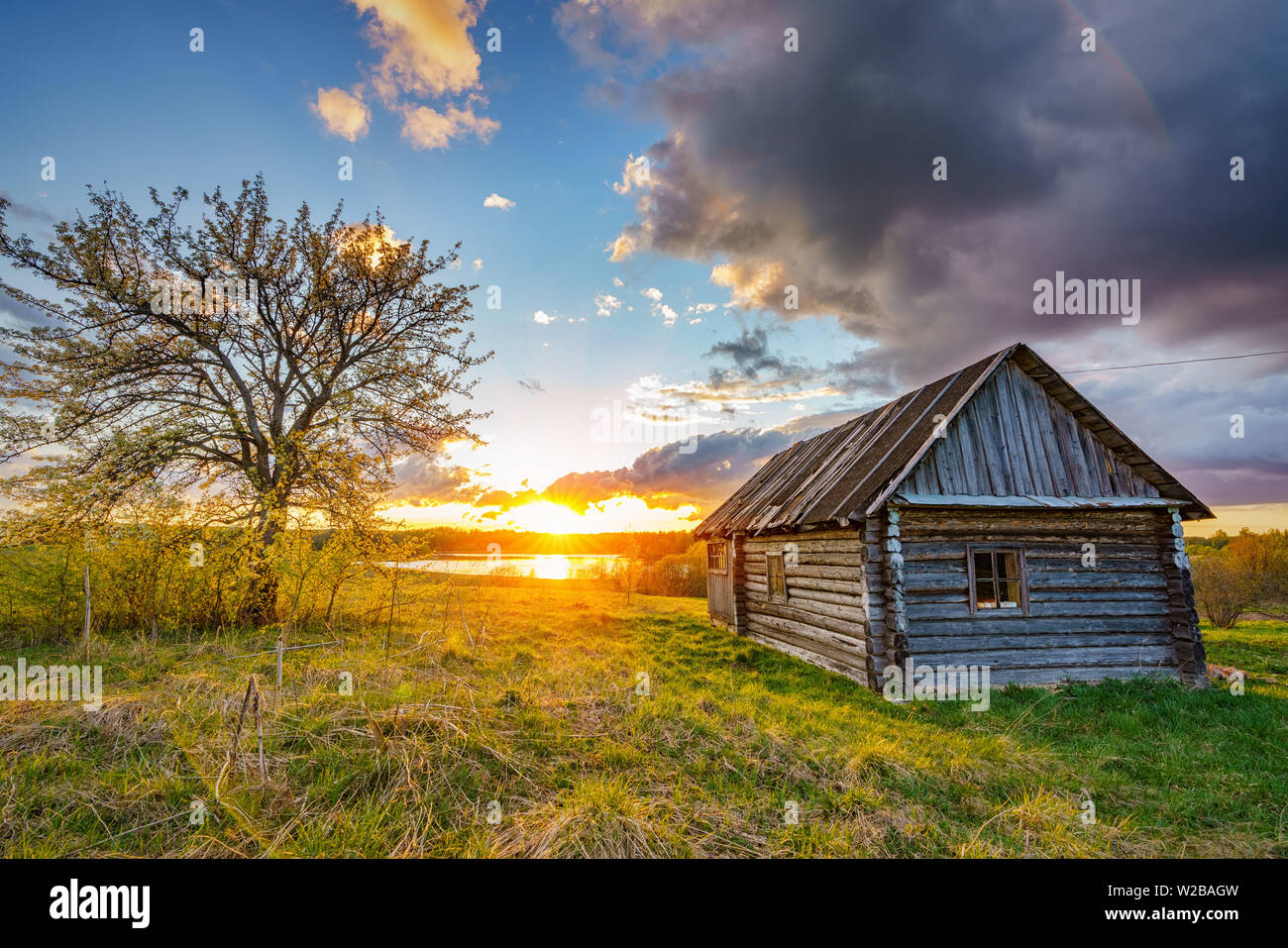 Colorful sunset in a countryside Stock Photo - Alamy