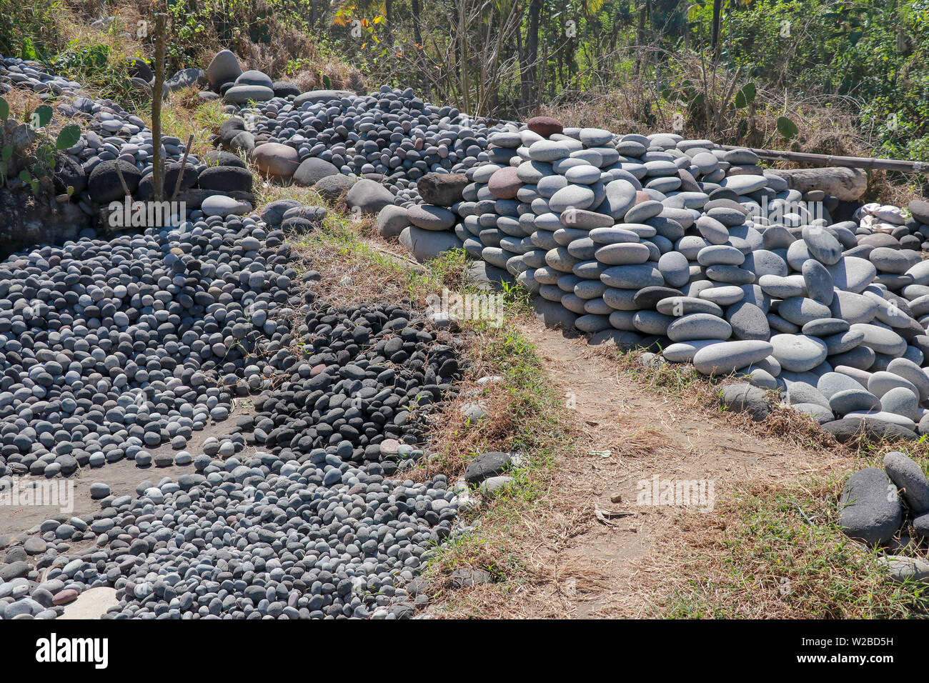 Selection of large stones. Pattern of round pebble stone. Background of ...