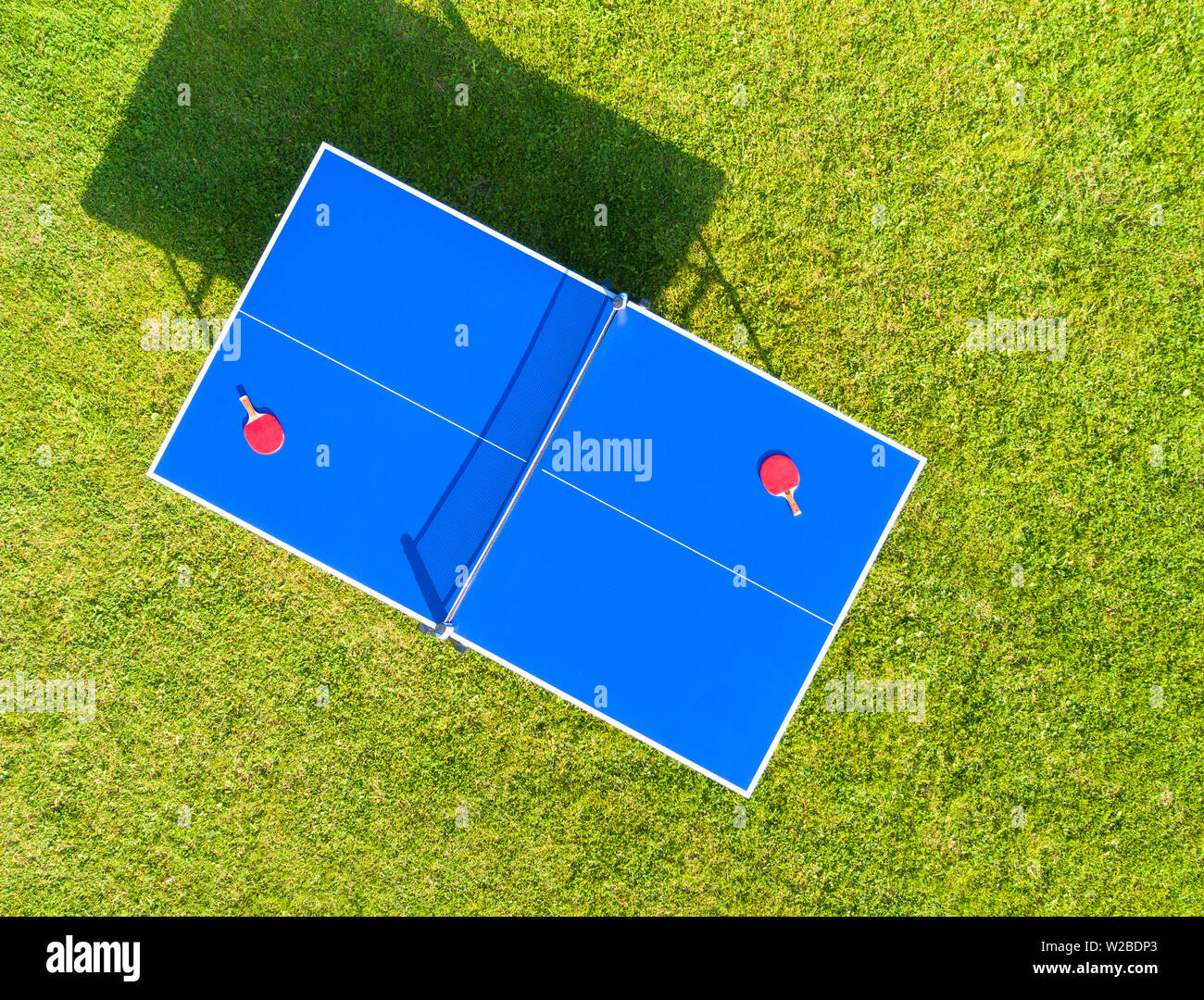 Aerial view blue table tennis or ping pong. Close-up ping-pong net ...