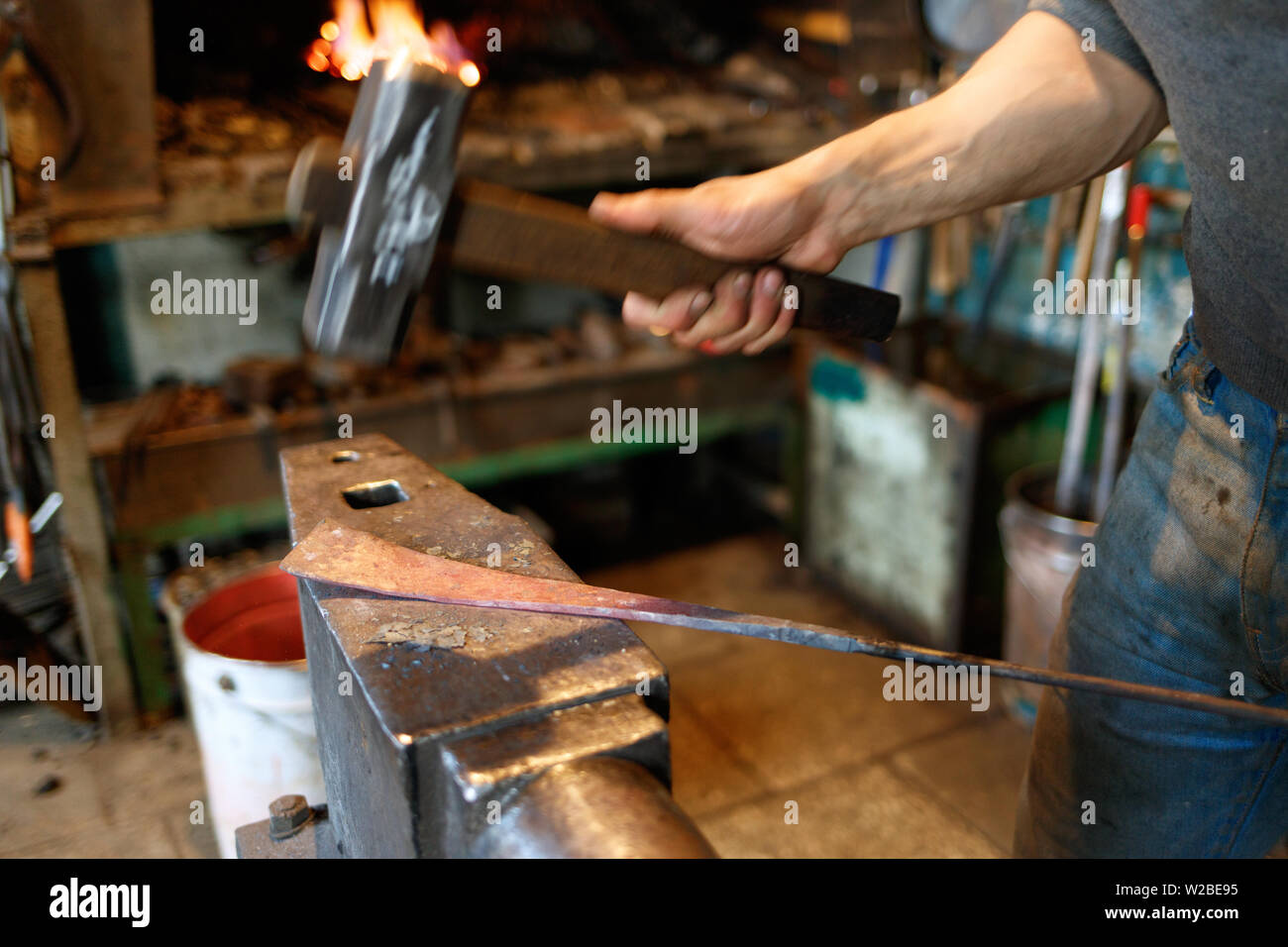 Close up blacksmith work hammering hi-res stock photography and images ...