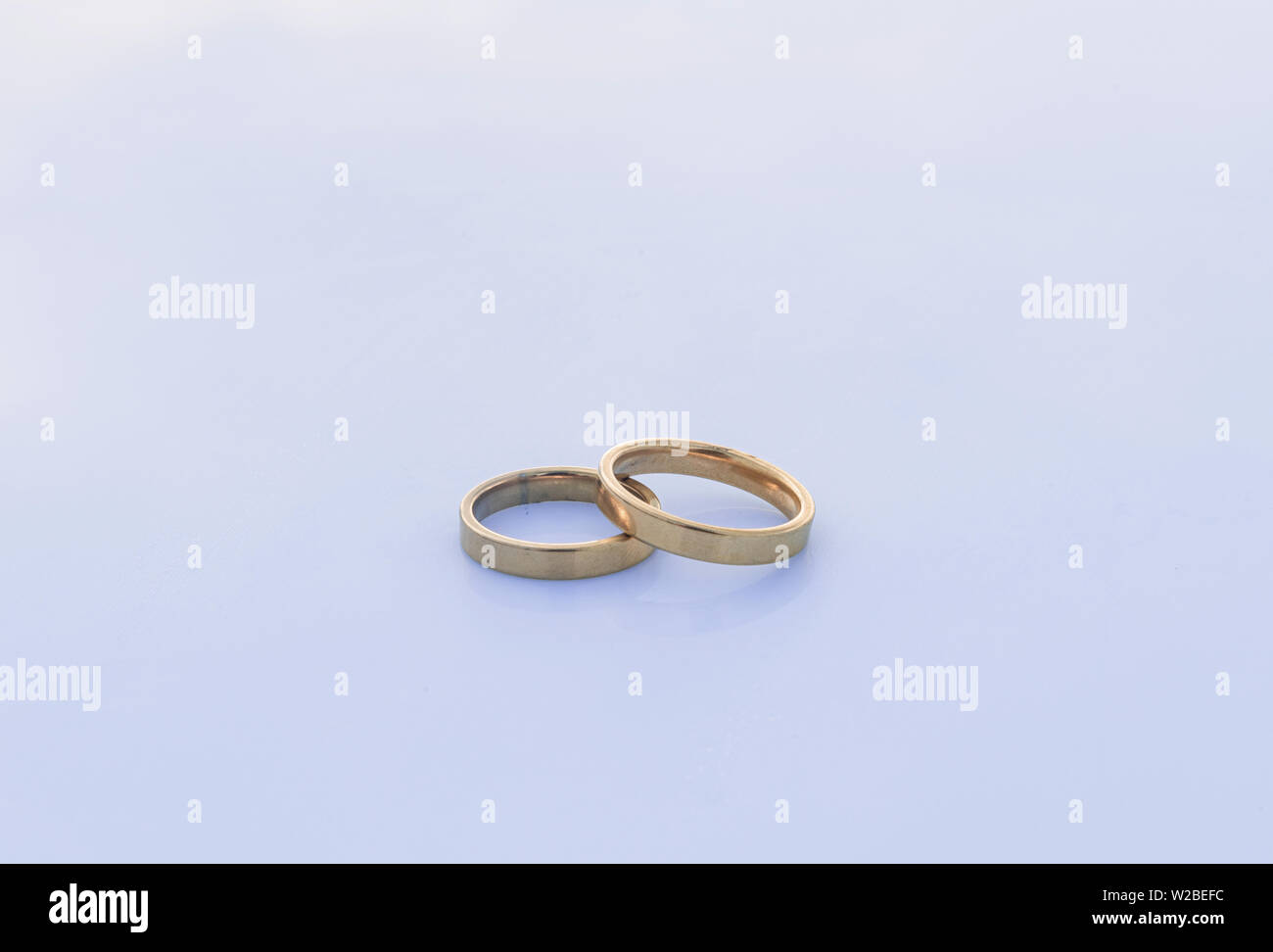 Gold wedding rings on table hi-res stock photography and images - Alamy