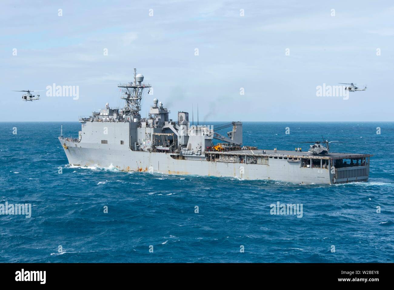 190707-N-DX072-1193 CORAL SEA (July 7, 2019) Two UH-1Y Huey helicopters ...