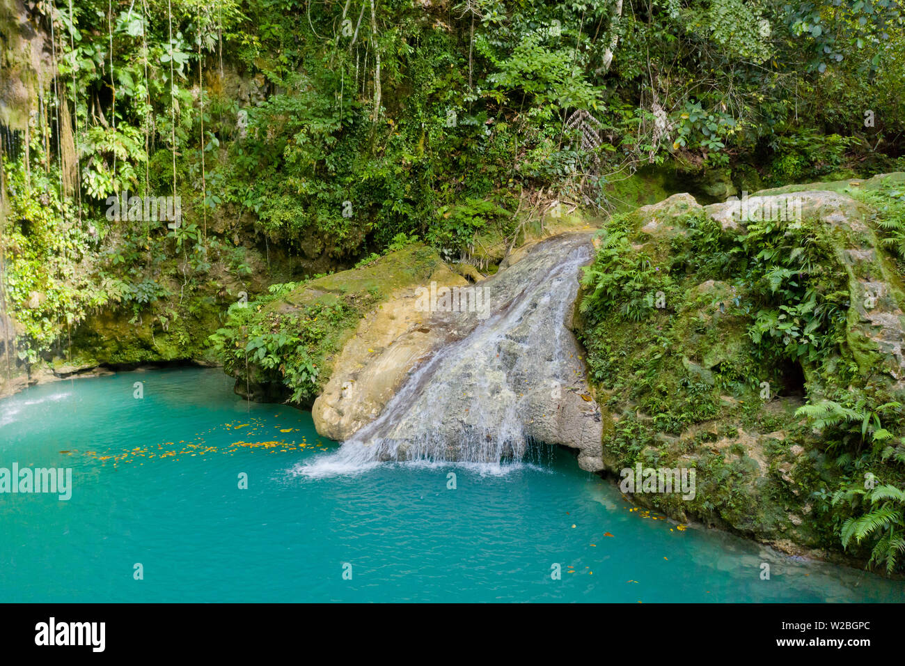 Aerial view of Cambais waterfalls in a mountain gorge in the tropical ...