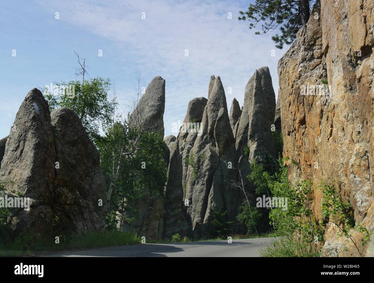 Row of dramatic rock formations near the Needle's Eye tunnel entrance ...
