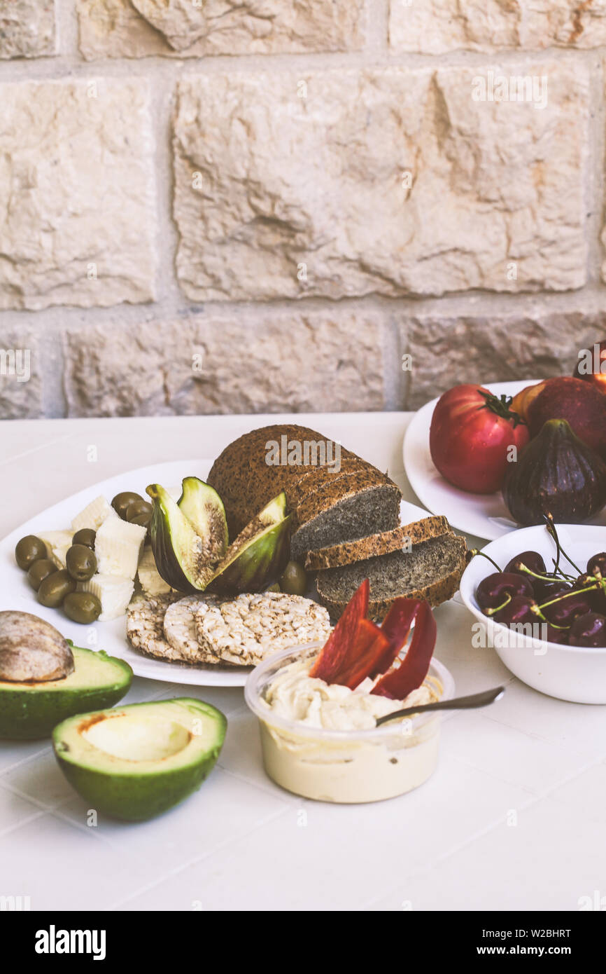 European healthy vegetarian lunch on a white table on the balcony Stock ...
