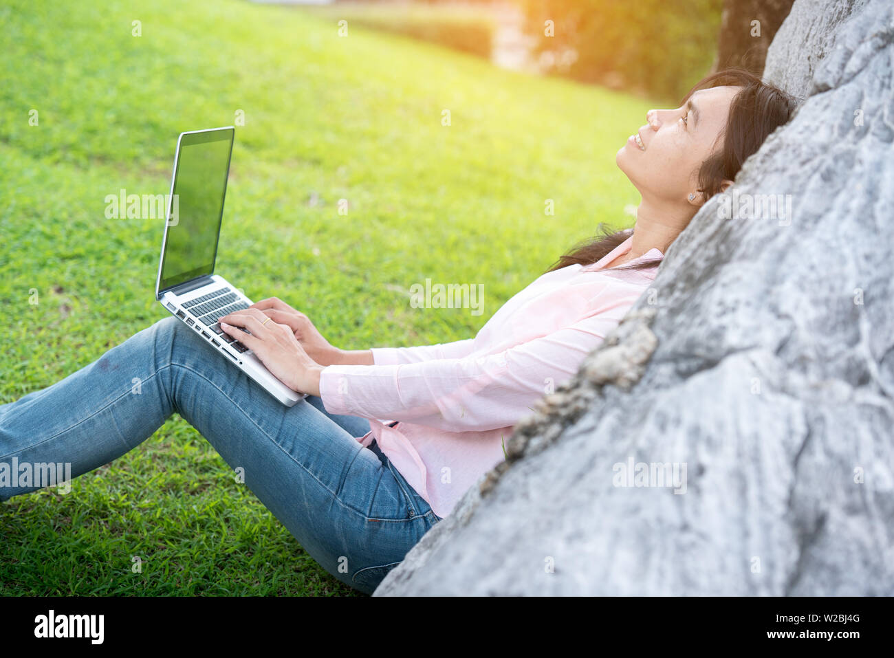 Relaxed Young Beautiful Woman Working Outdoor Stock Photo - Alamy