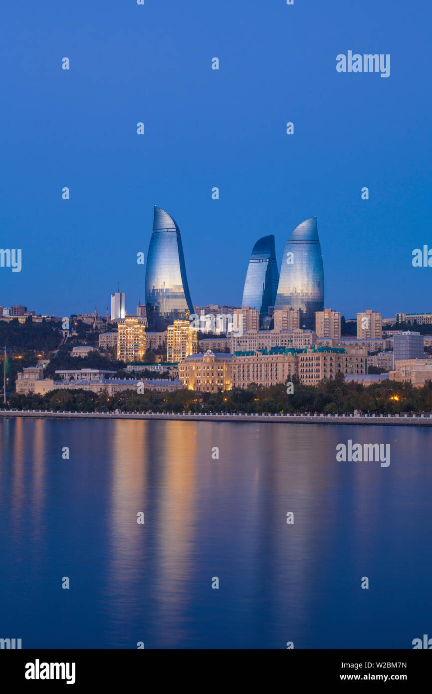 Azerbaijan, Baku, View of the Flame Towers reflecting in the Caspian ...