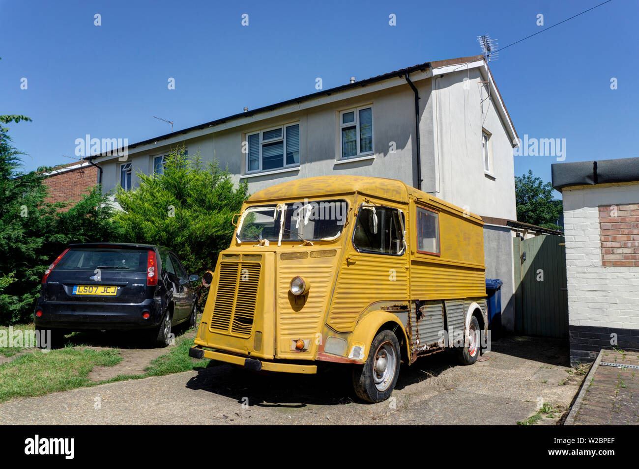 vintage citroen yellow corrugated van parked out side former council ...