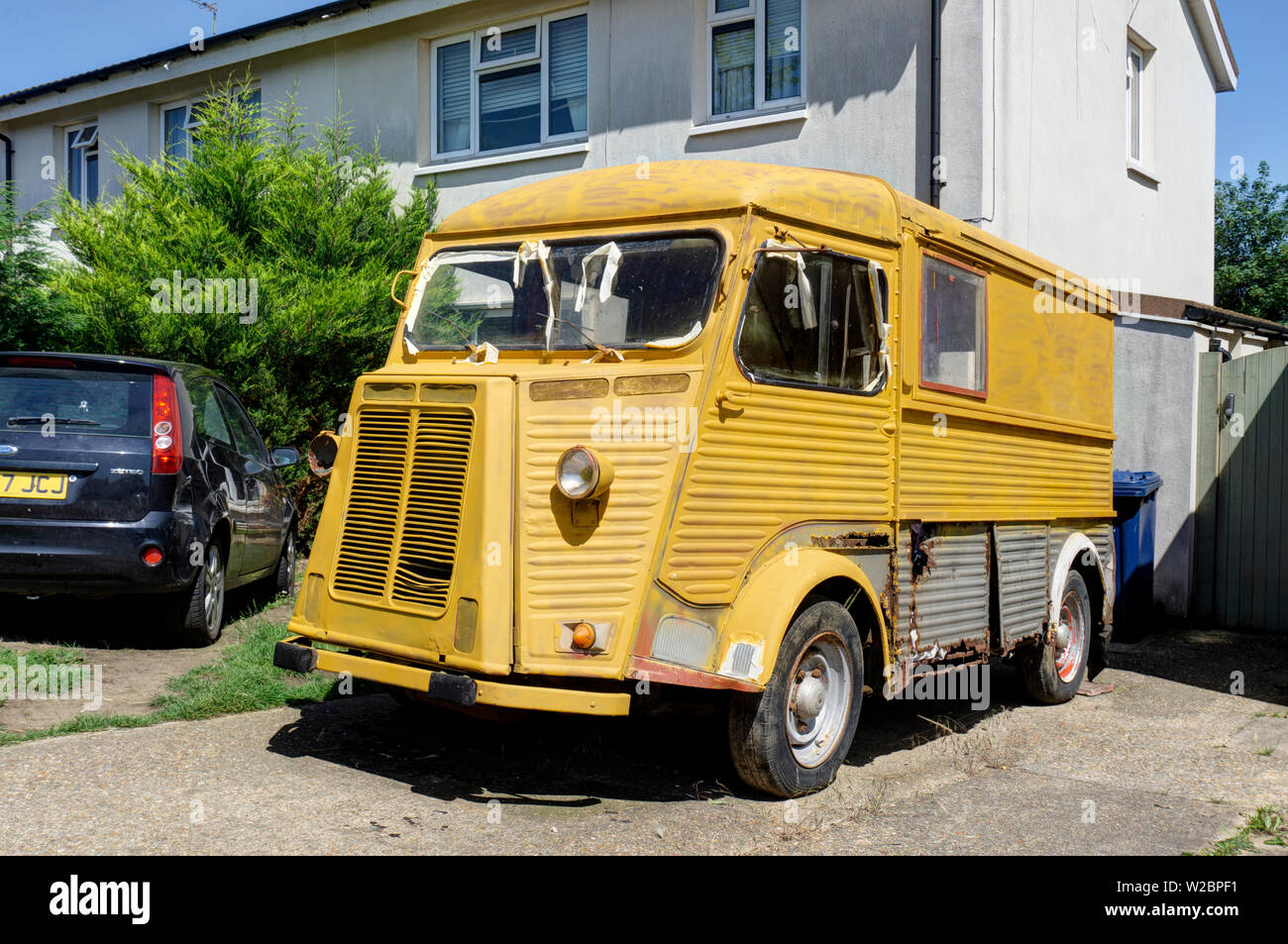 vintage citroen yellow corrugated van parked out side former council ...