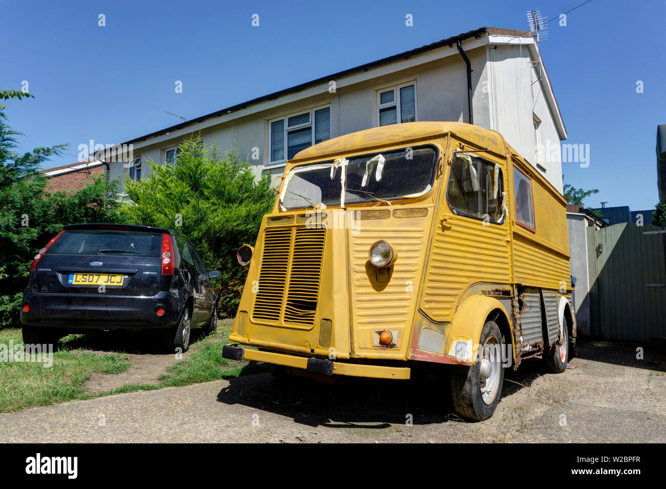 vintage citroen yellow corrugated van parked out side former council ...