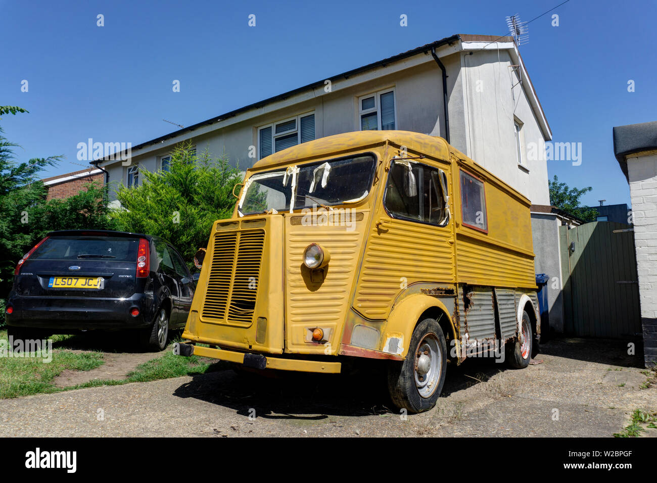 vintage citroen yellow corrugated van parked out side former council ...