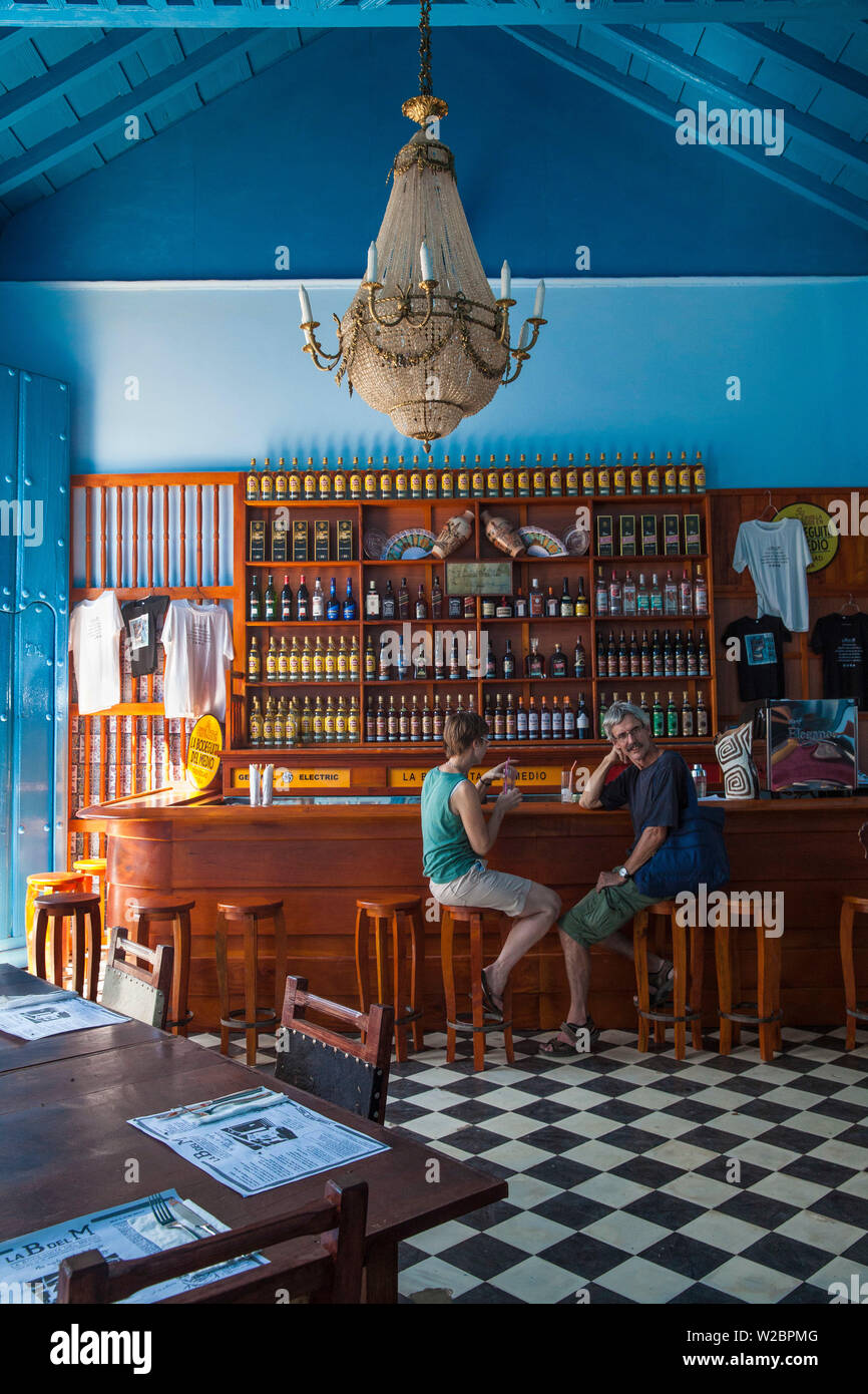 Cuba, Trinidad, Tourists at bar/restaurant in historical center Stock ...