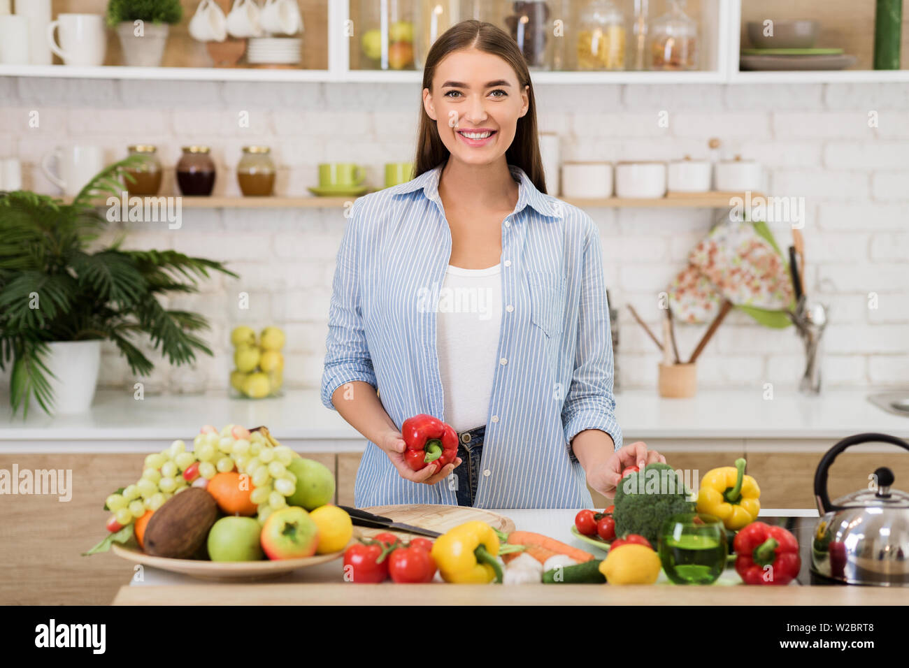 Beautiful woman cooking organic hi-res stock photography and images - Alamy