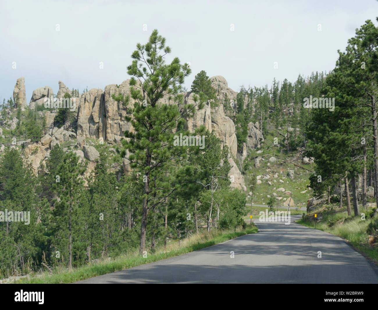 Winding road with dramatic granite formations at Needles Highway in ...