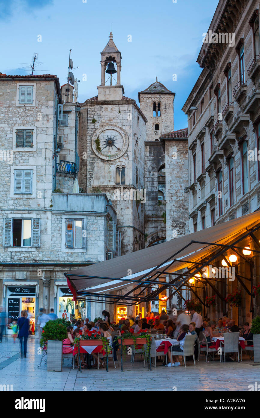 Restaurant fronting the Iron Gate & Clock Tower at dusk, Stari Grad ...