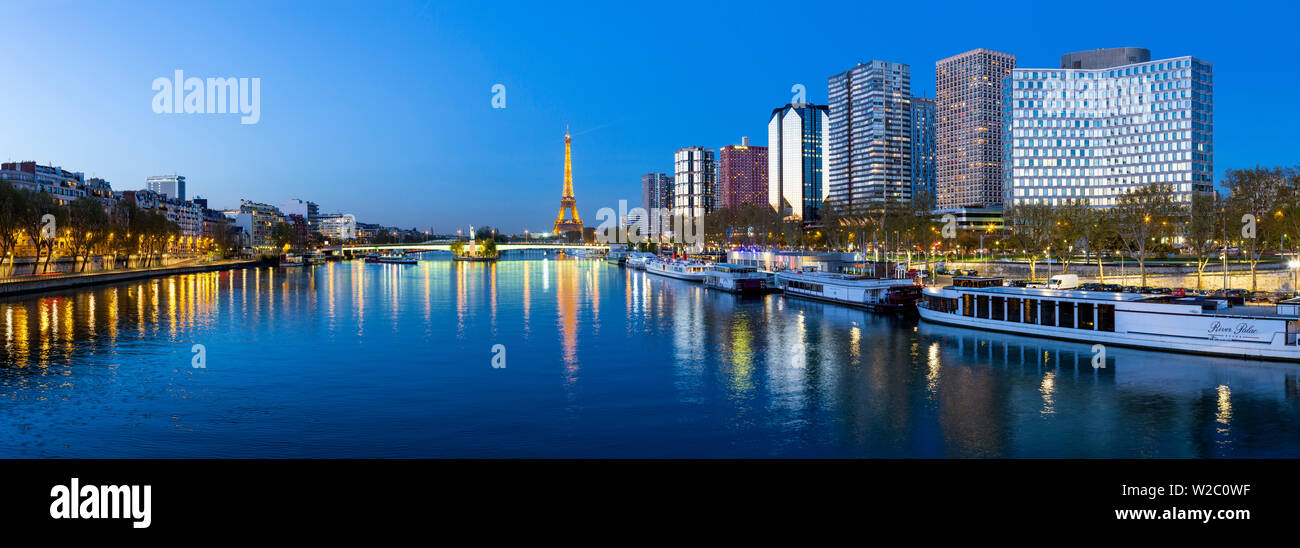 Night view of River Seine with high-rise buildings on the Left Bank ...
