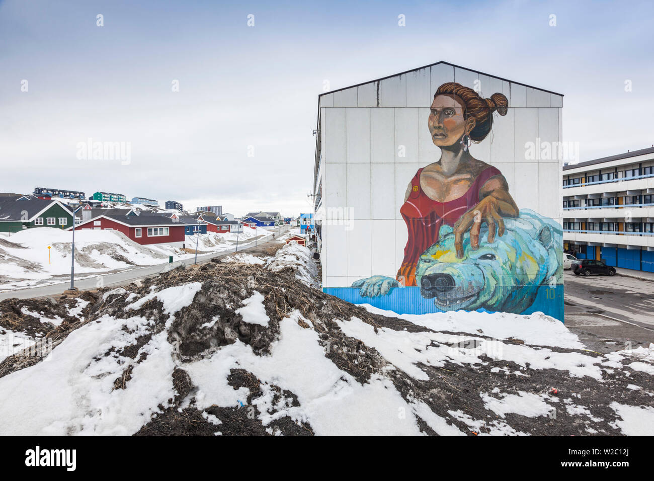 Greenland, Nuuk, city housing projects with Inuit art mural Stock Photo ...