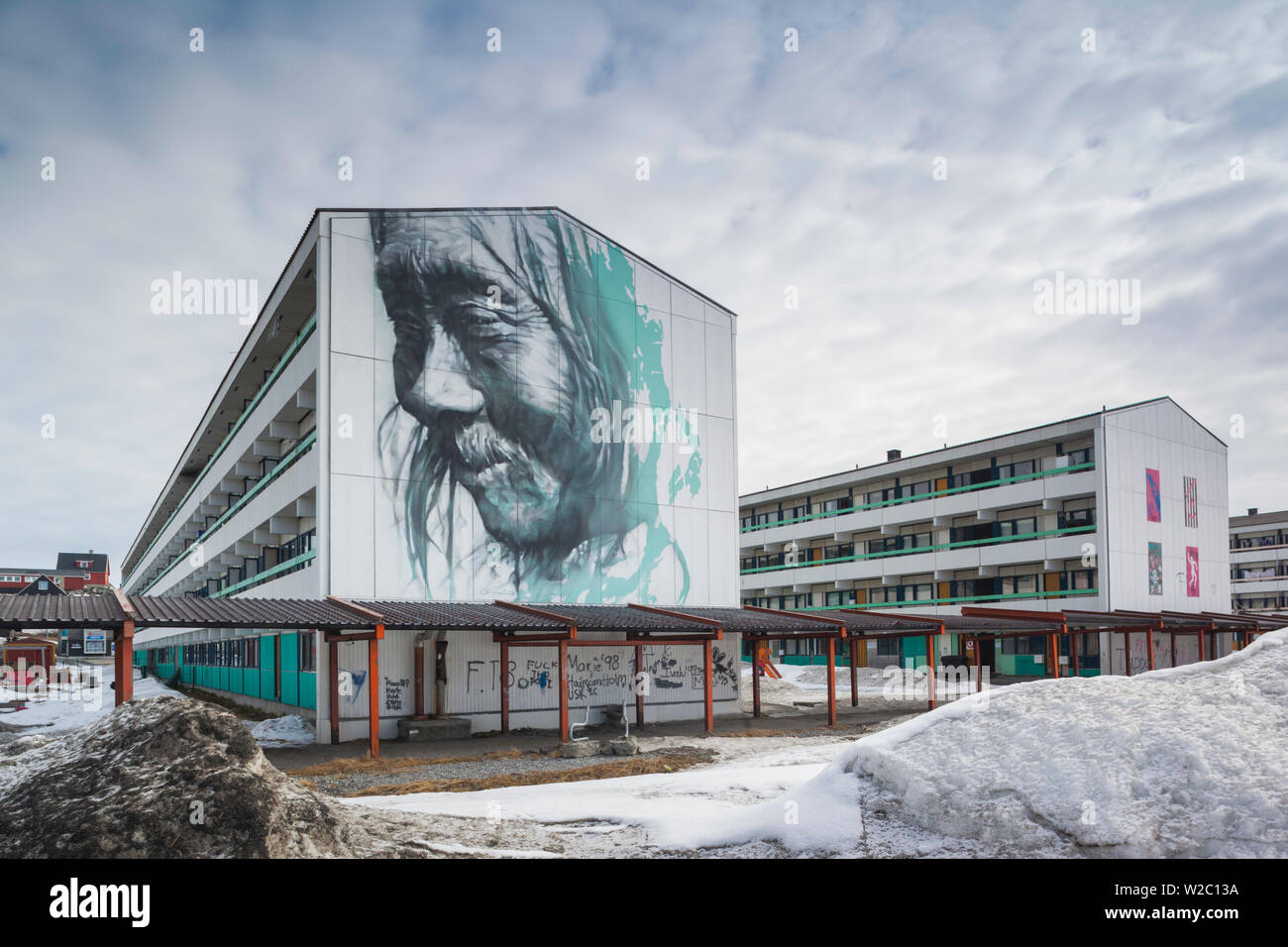 Greenland, Nuuk, city housing projects with Inuit art mural Stock Photo ...