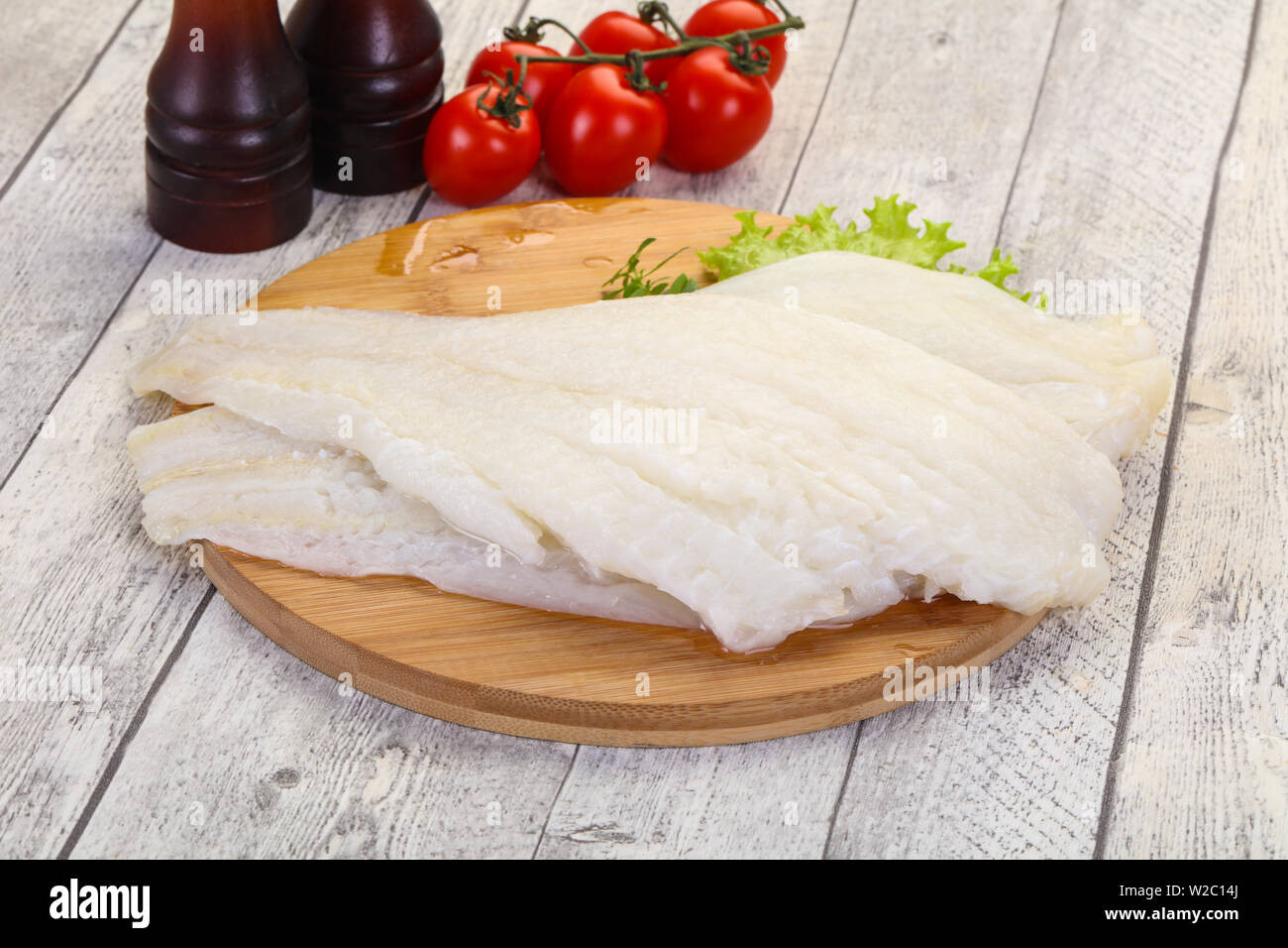 Raw halibut fillet ready for cooking Stock Photo - Alamy