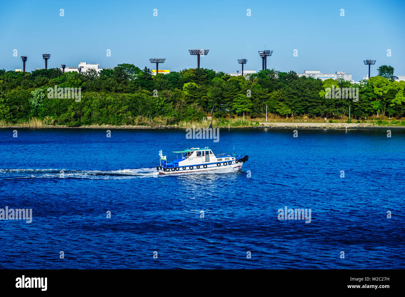 Tokyo, Japan - May 8, 2019: Speed boat cruising in coastal area of ...