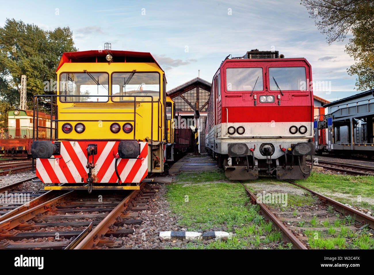 Two trains in depot at a day Stock Photo - Alamy