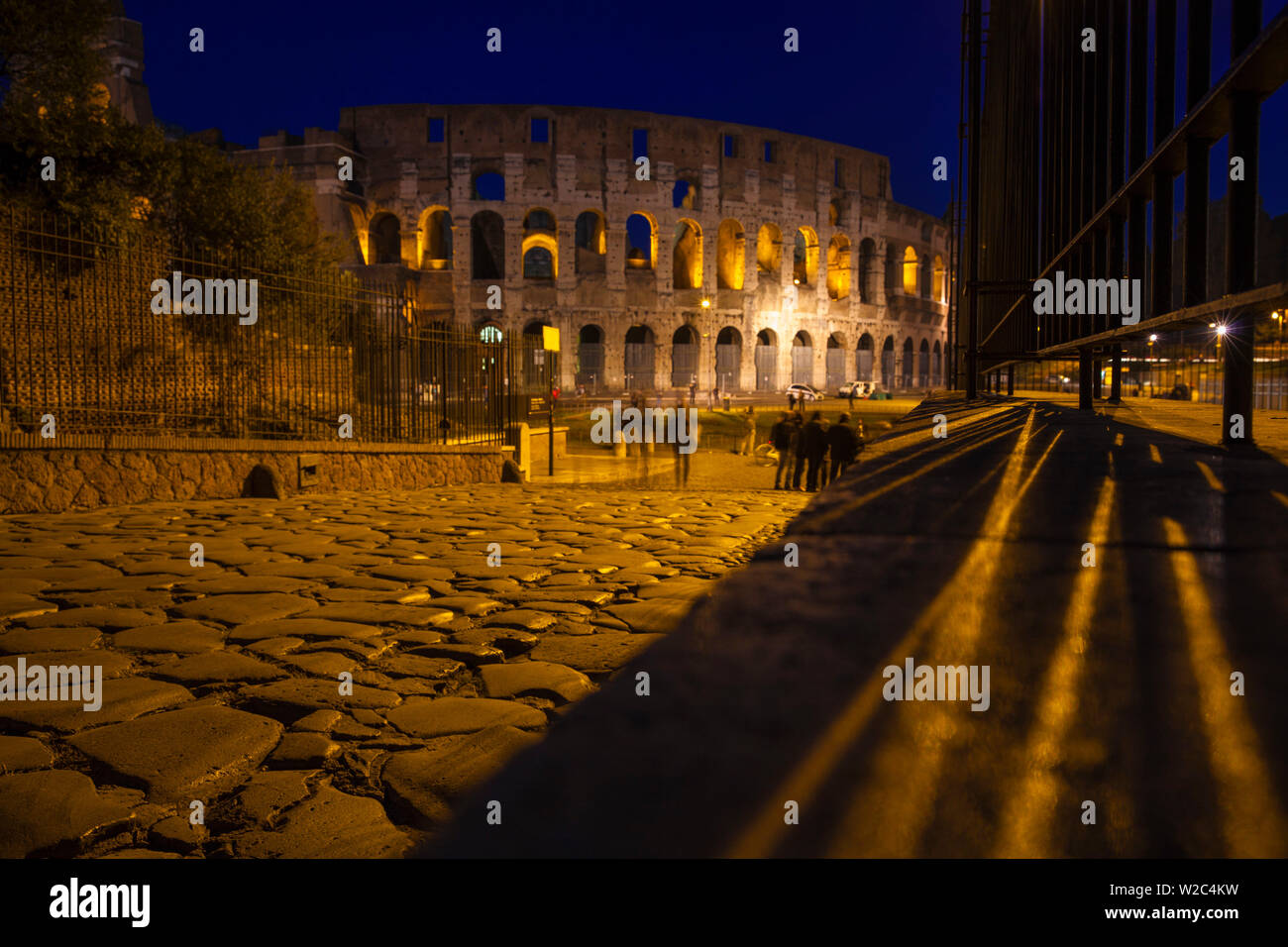 Italy, Lazio, Rome, Cobbled path leading to The Colosseum Stock Photo ...