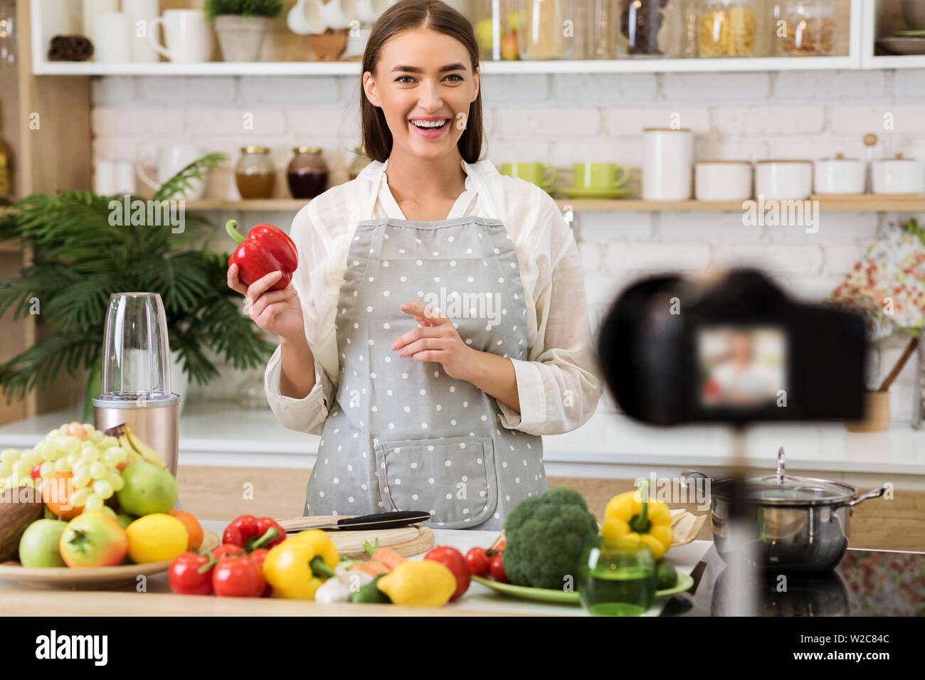 Food blogger working on new video, explaining how to cook Stock Photo ...