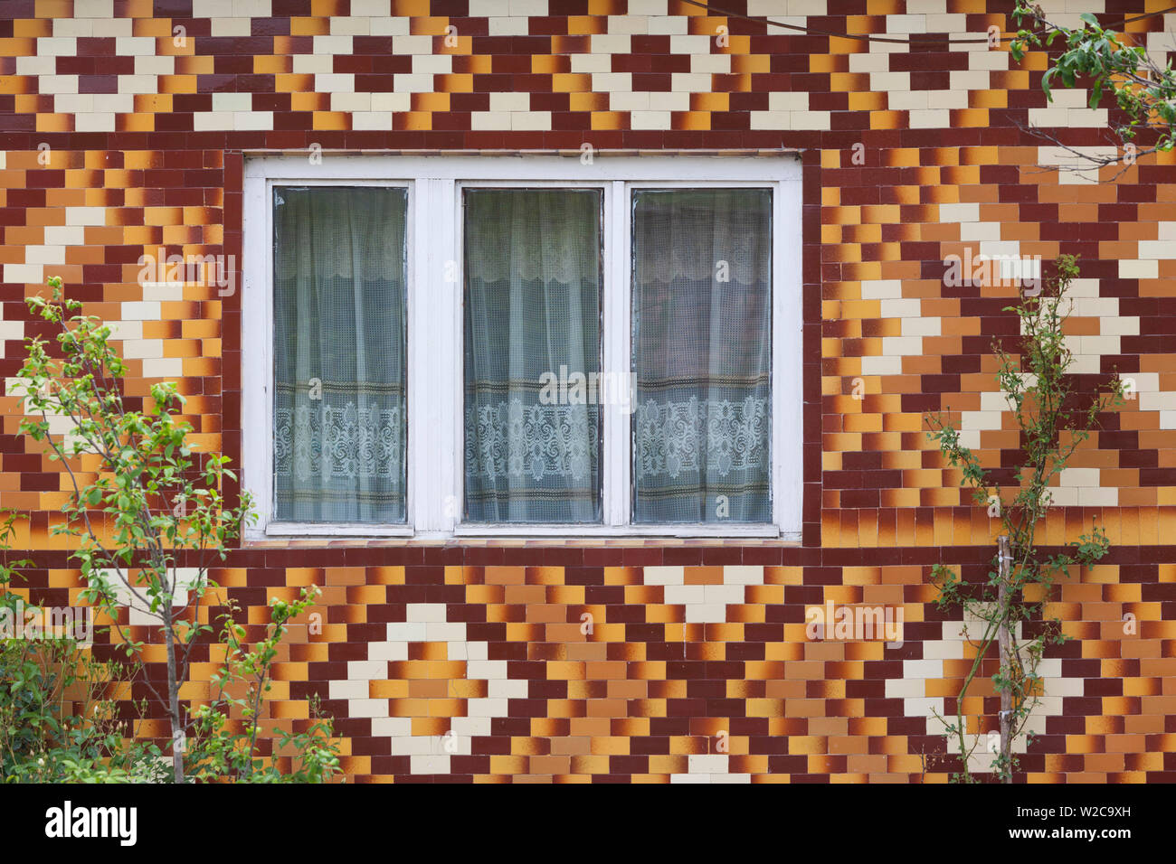 Romania, Transylvania, Viile Tecii, house detail with tile pattern ...
