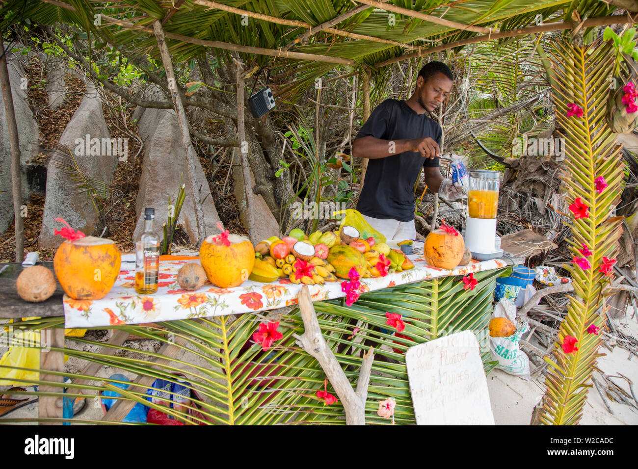 Beach stall selling rum and fruit drinks, nse Source D'Argent beach, La ...