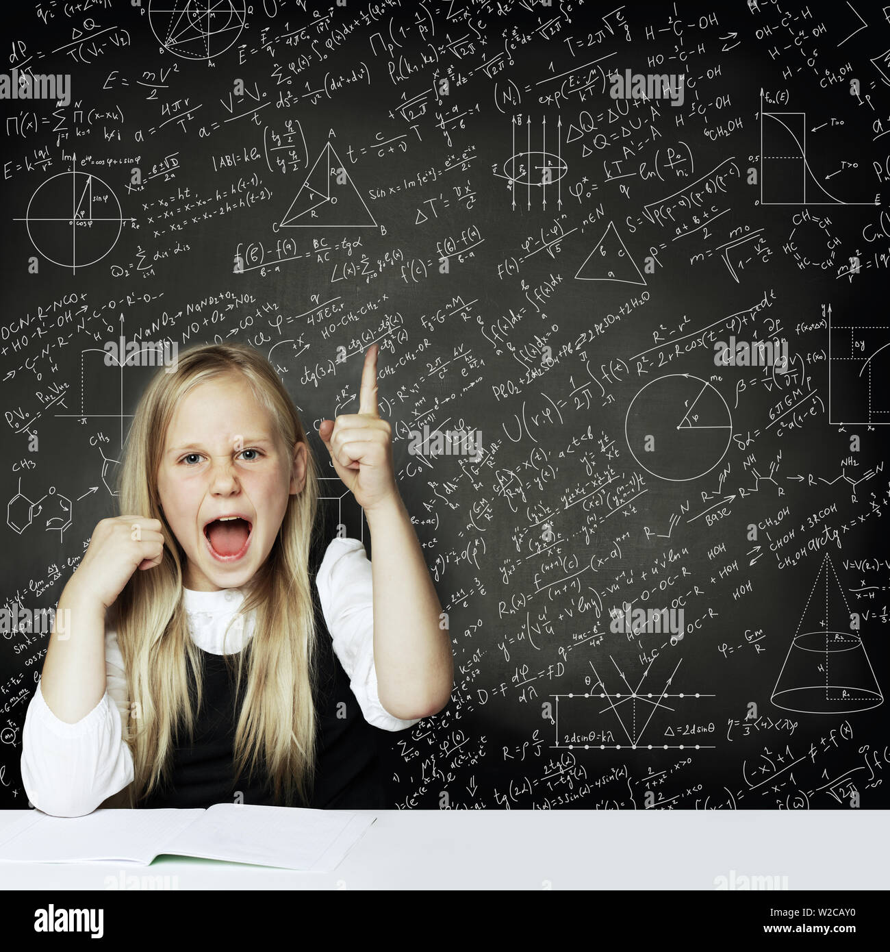 Cute smart child student girl have idea. blackboard background with ...