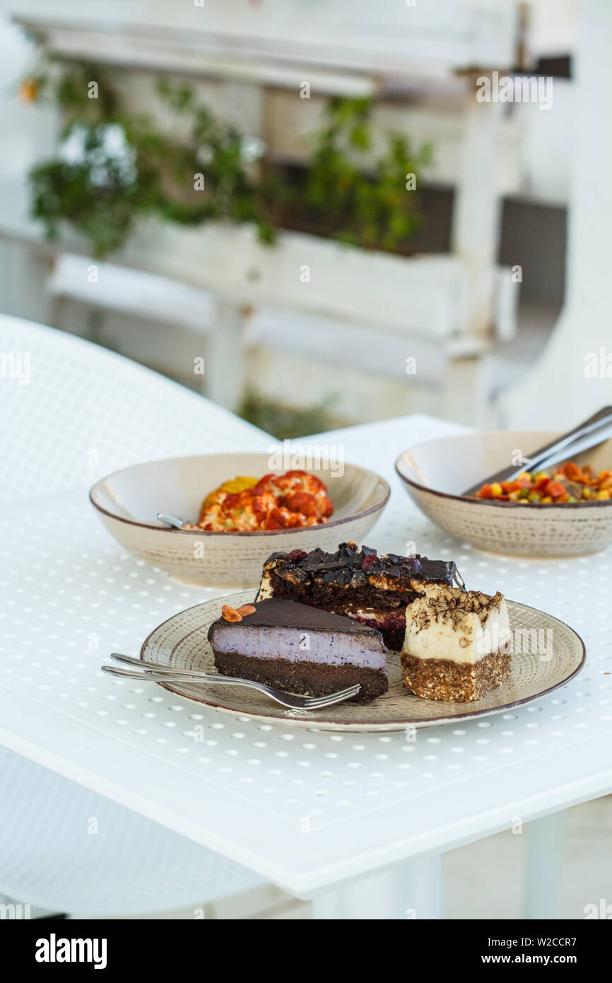 Vegan cafe table. Vegetarian food and desserts on the table Stock Photo ...