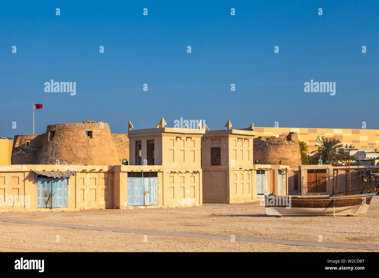 Bahrain, Manama, Arad Fort and traditional buildings with wind towers ...