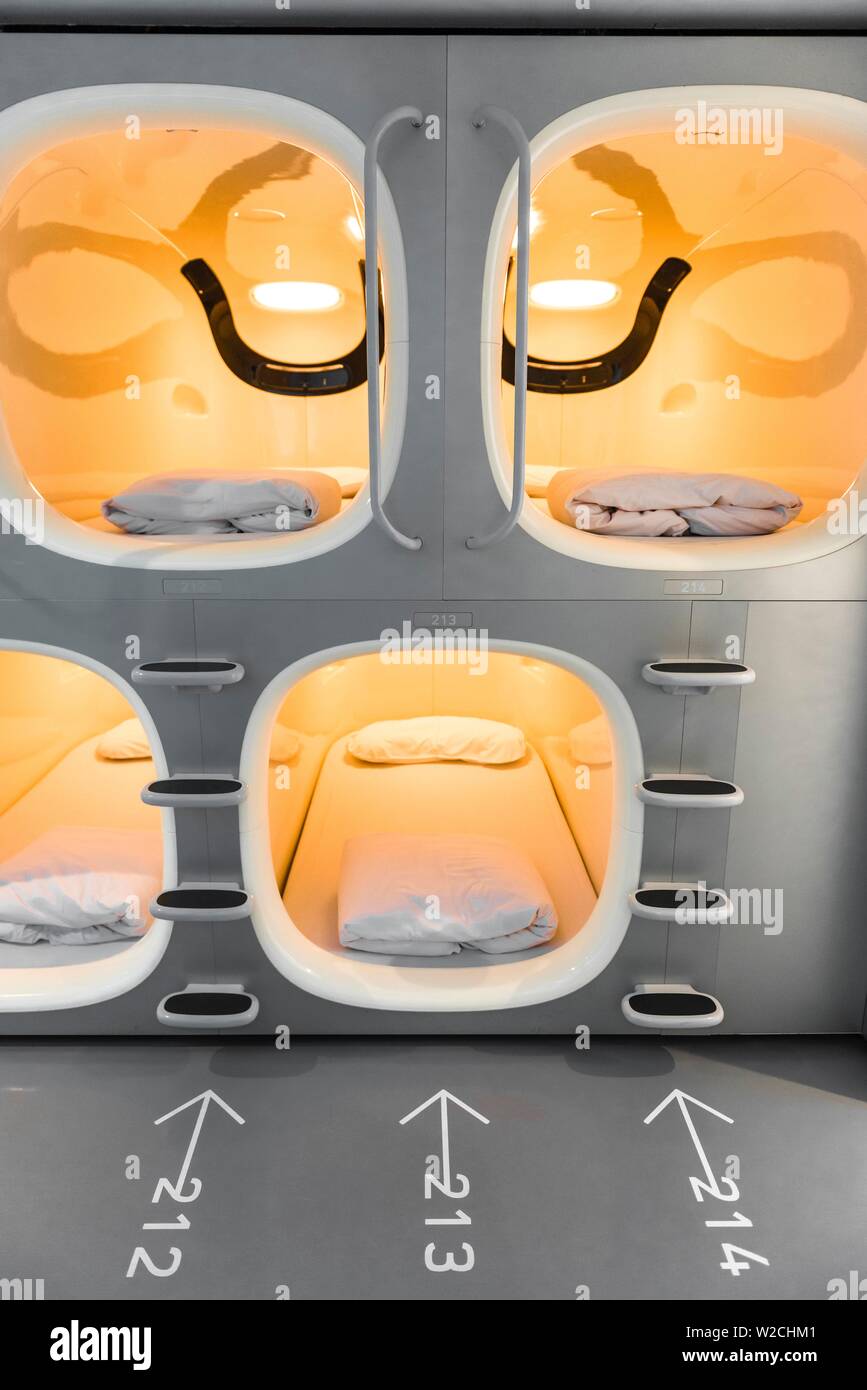 Sleeping capsules in 9hours Hotel, capsule hotel, Tokyo, Japan Stock ...