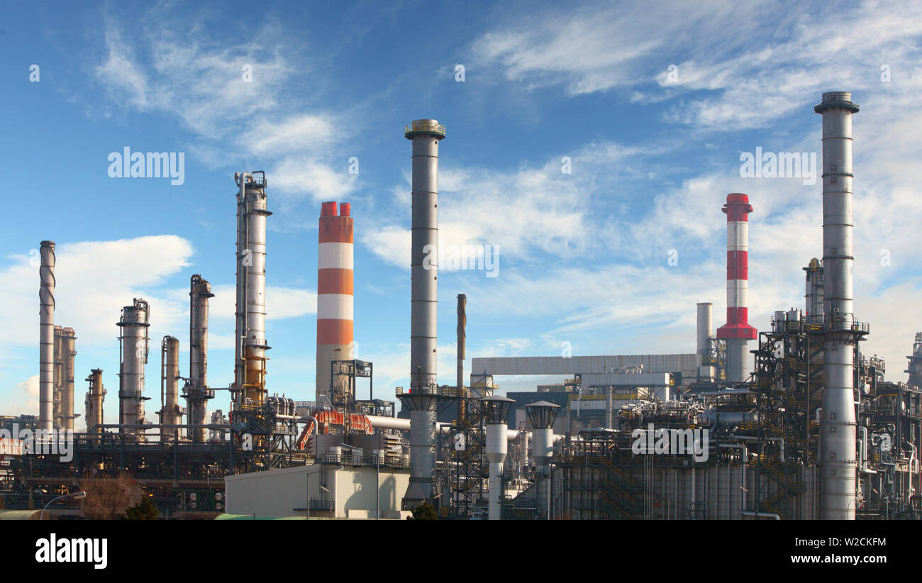 Oil refinery at a day, factory plant Stock Photo - Alamy