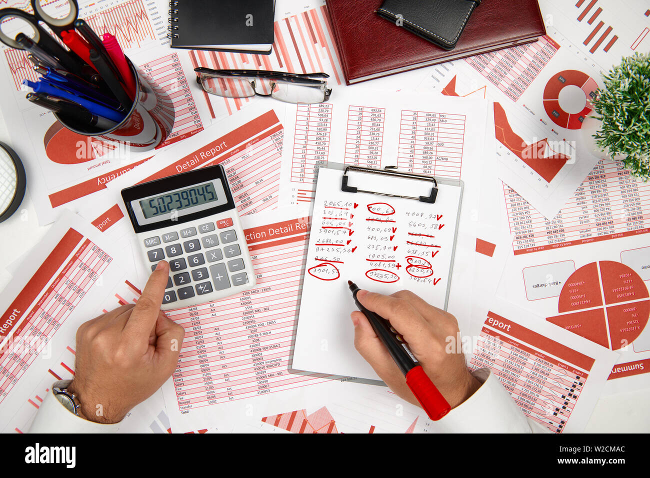 Business reports, data tables and charts - directly above view of ...