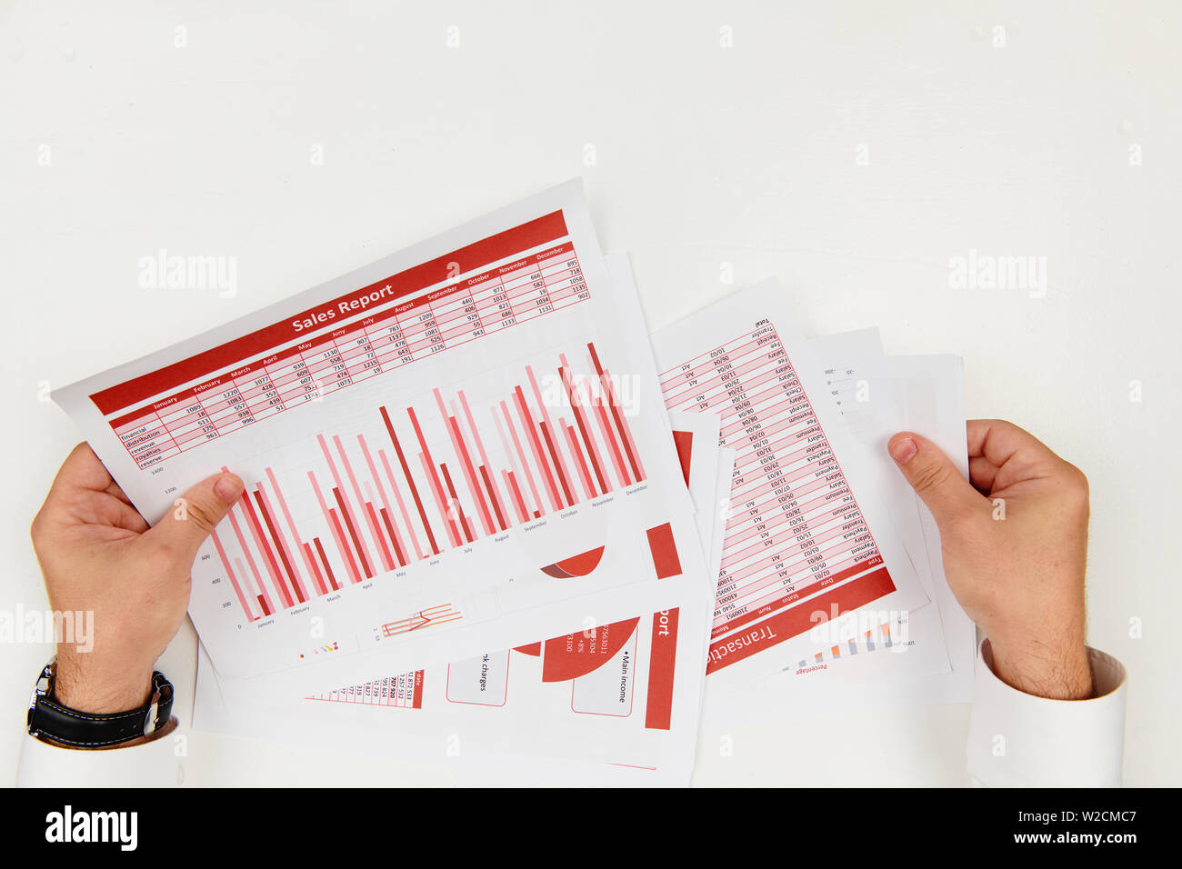 Business reports, data tables and charts - directly above view of ...