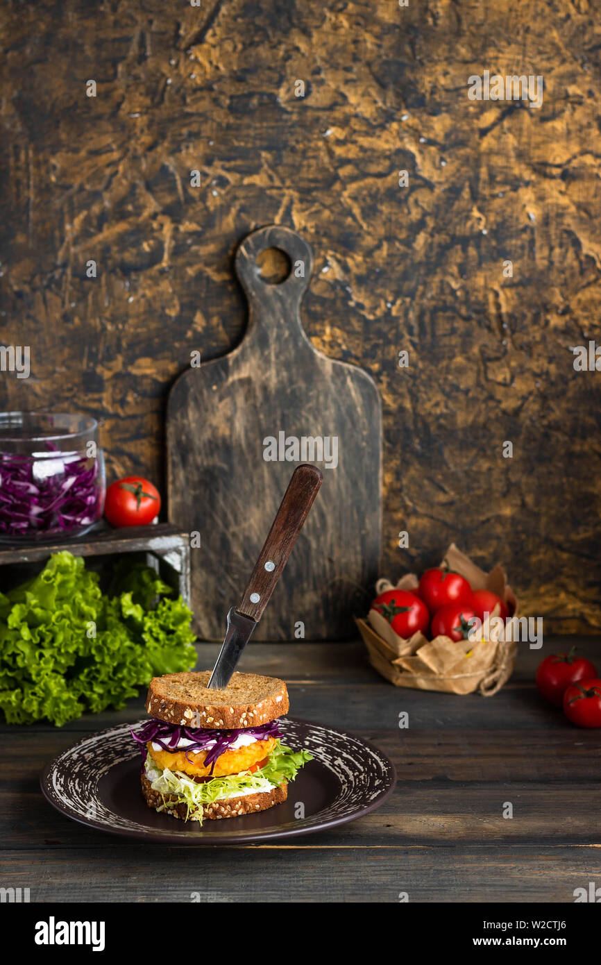 Veggie sandwich with rice cutlet and red cabbage Stock Photo - Alamy