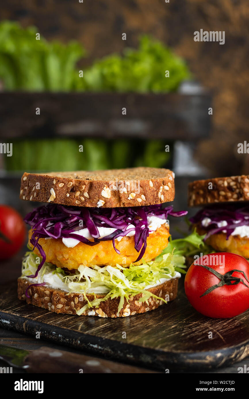 Veggie sandwich with rice cutlet and red cabbage Stock Photo - Alamy
