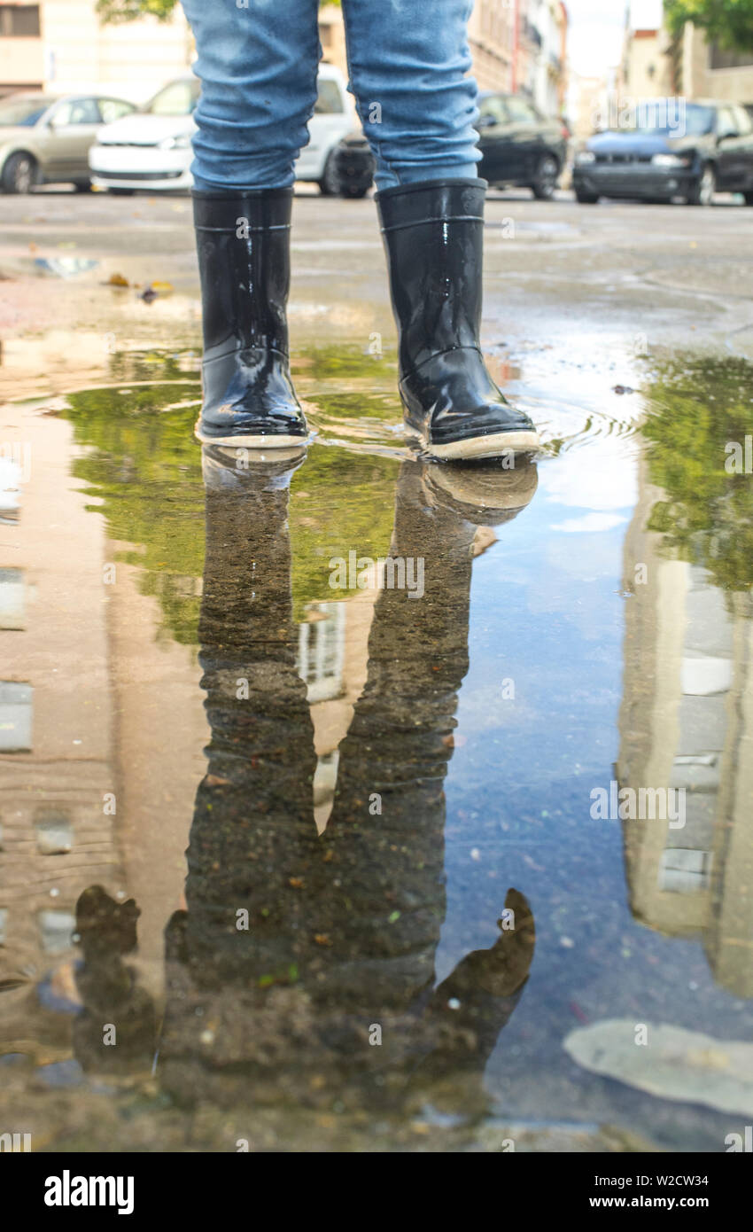 Children boy splash puddle hi-res stock photography and images - Alamy