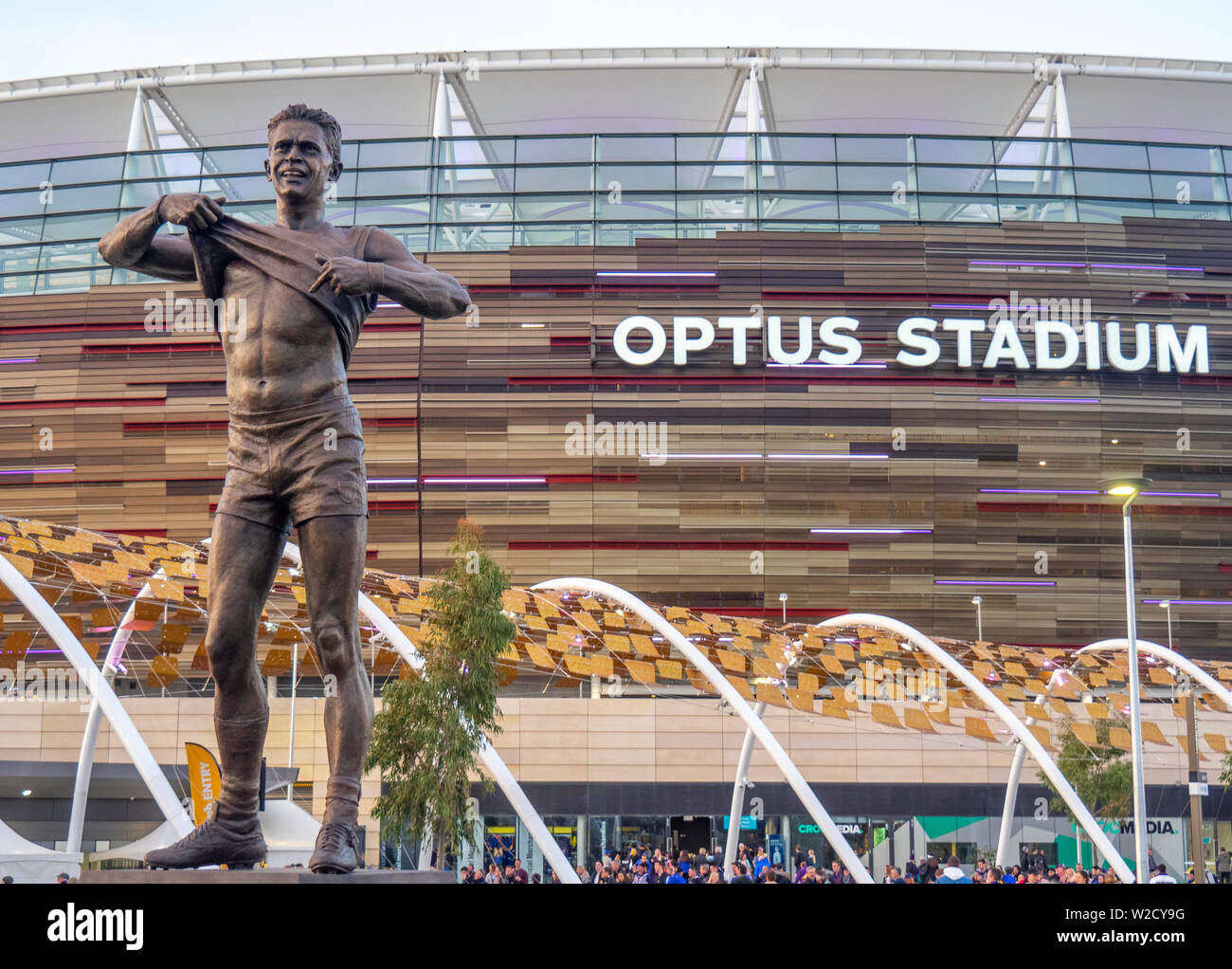 Bronze Statue of Nicky, Neil Elvis Winmar, an indigenous Noongar AFL footballer outside of Optus ...
