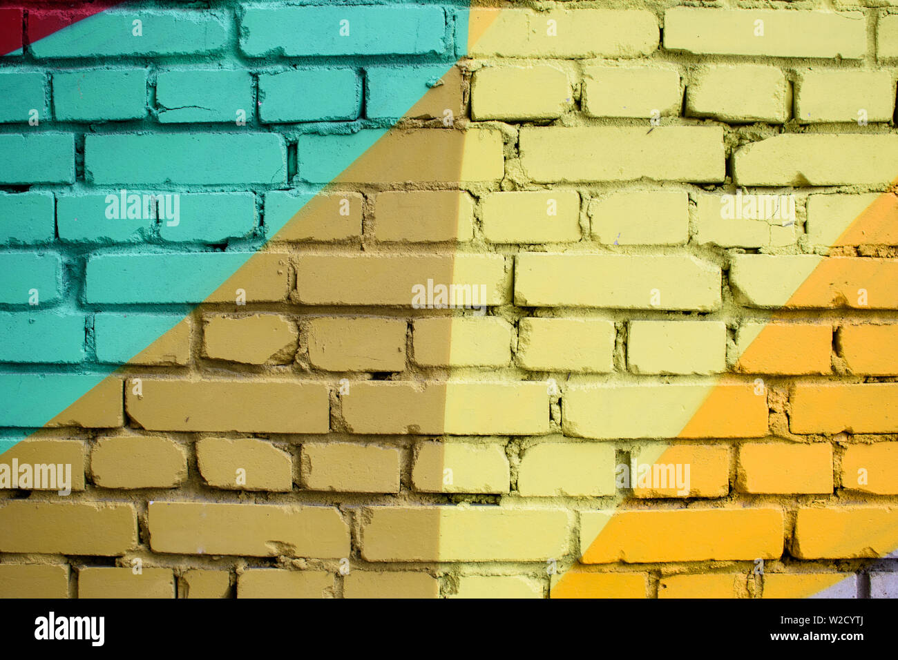 Multi-colored brick surface, painted in different colors. Creative ...