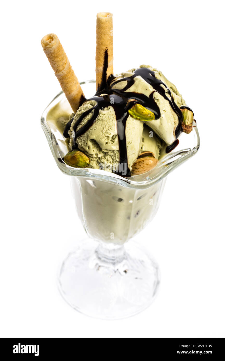 ice cream sundae: pistachio ice cream sundae with chocolate sauce and ...